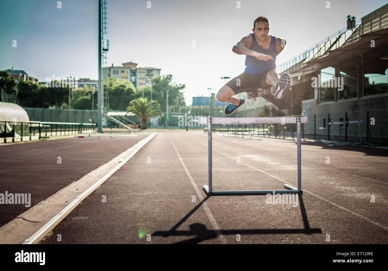 Man Jumping Hurdle High Resolution Stock Photography and Images - Alamy
