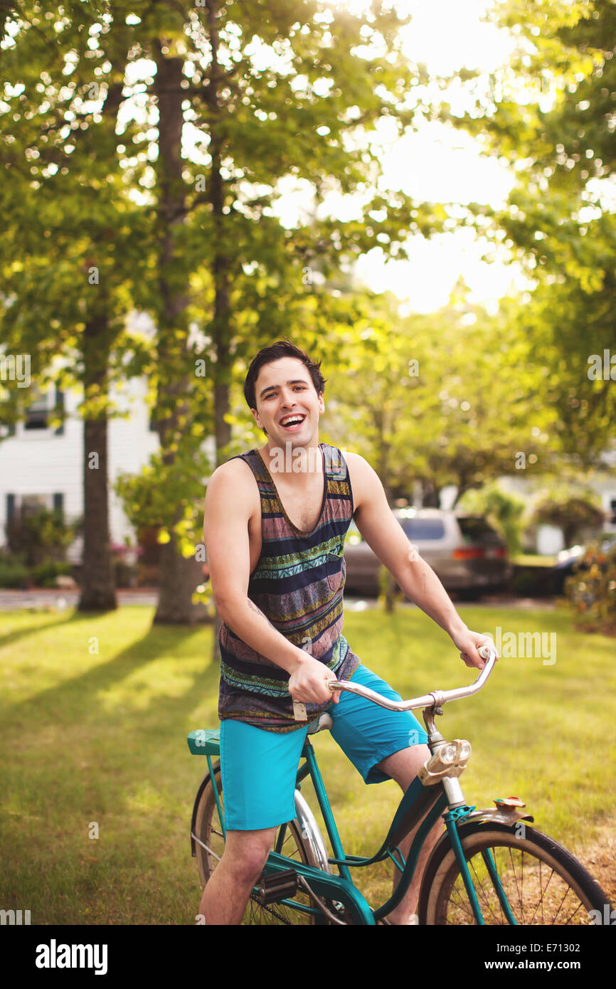 Young man on bike Stock Photo - Alamy