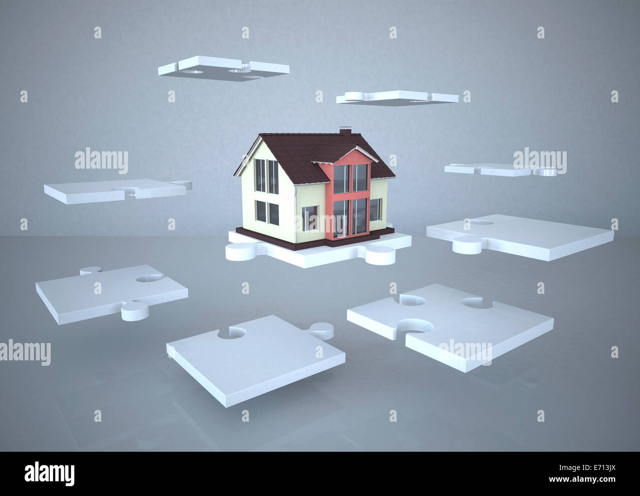 Family home on jigsaw puzzle Stock Photo - Alamy