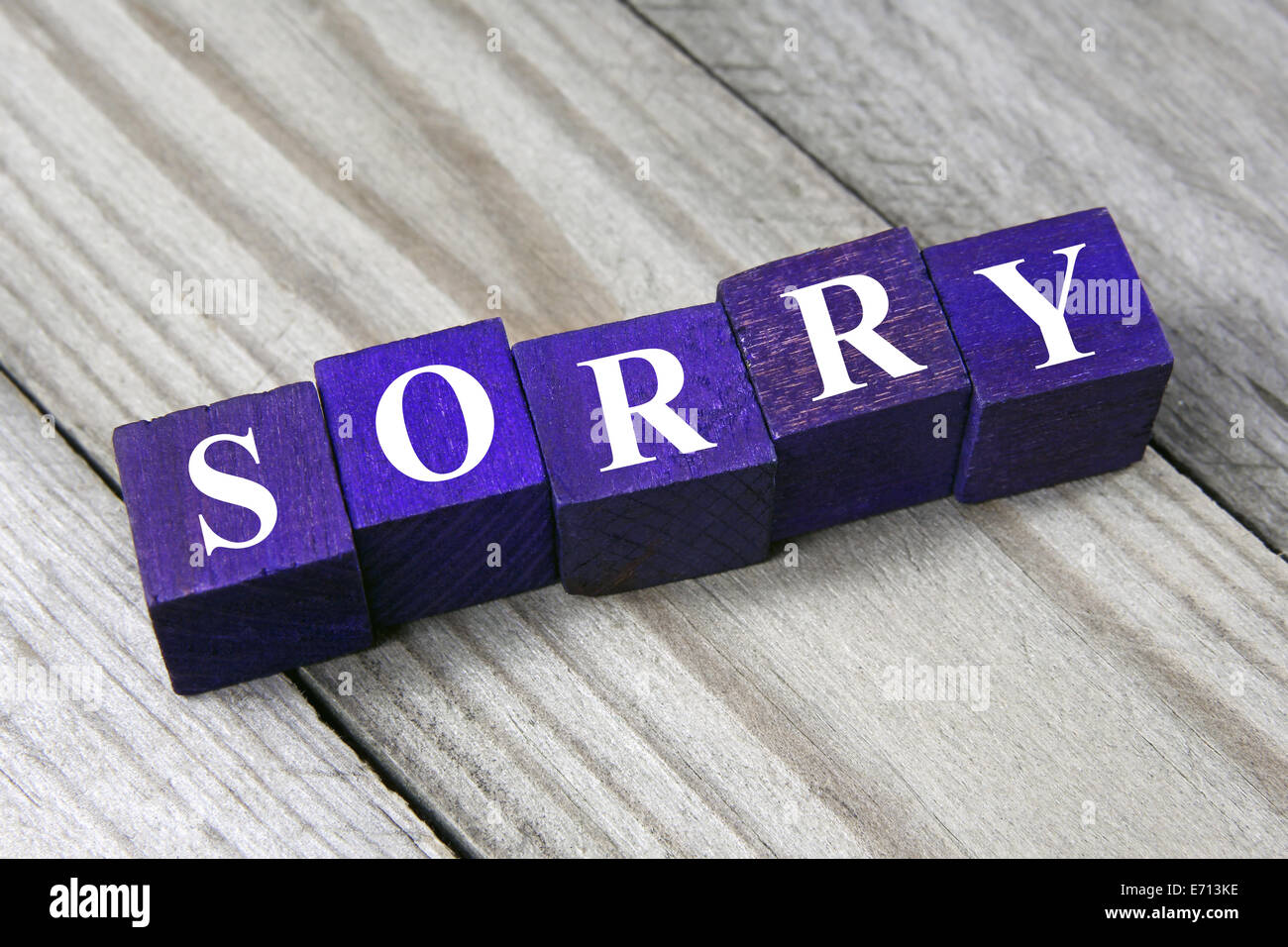 sorry word on wooden cubes Stock Photo - Alamy