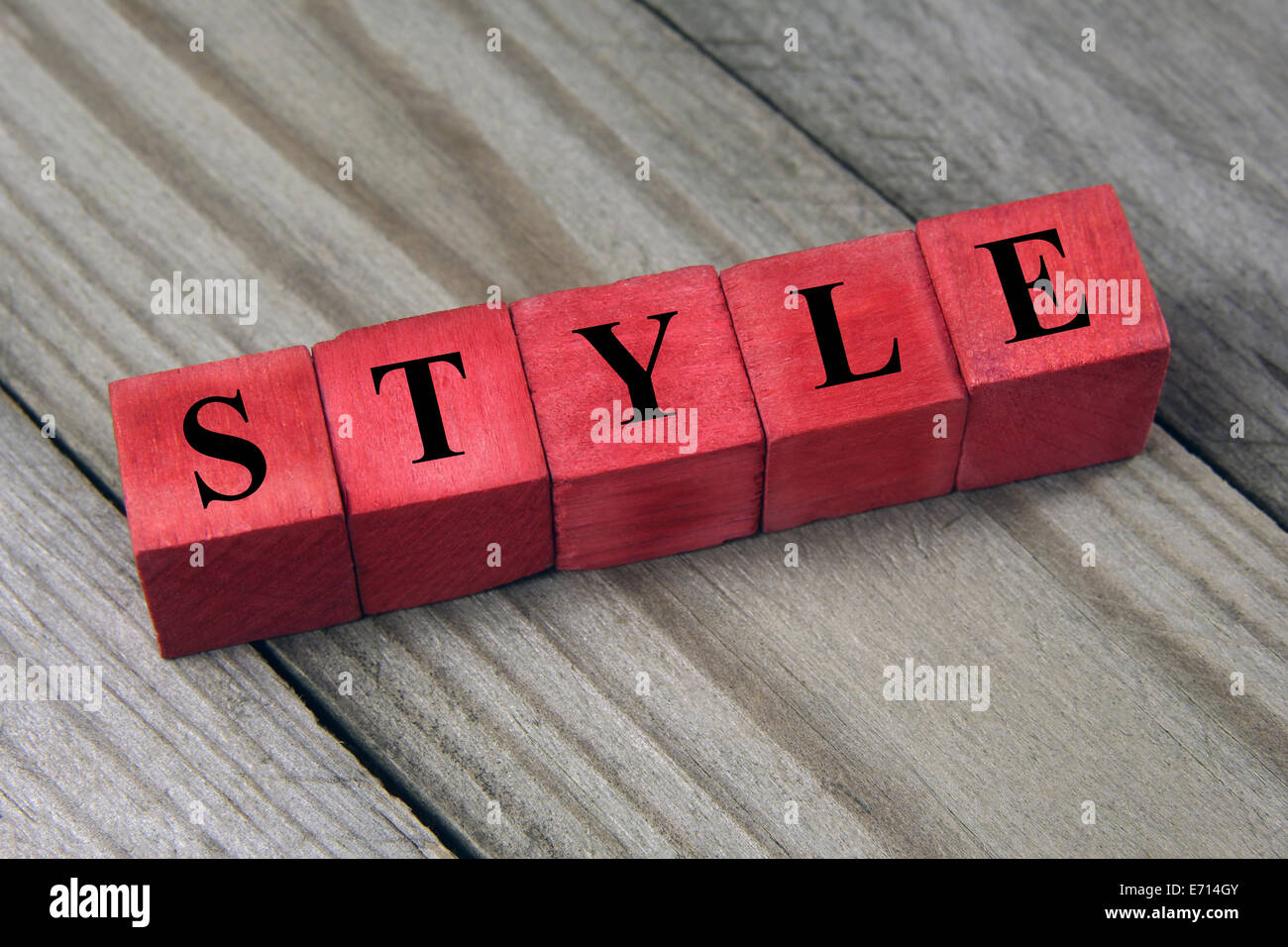 word style on red wooden cubes Stock Photo - Alamy