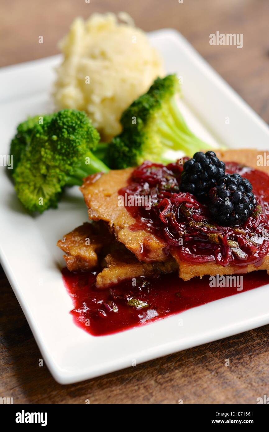 Seitan fillets with a blackberry sage sauce, mashed potatoes and ...