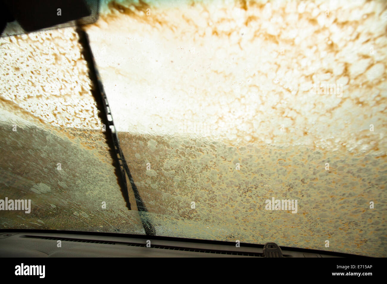 Iceland, windscreen wiper on moving on dirty windscreen Stock Photo - Alamy