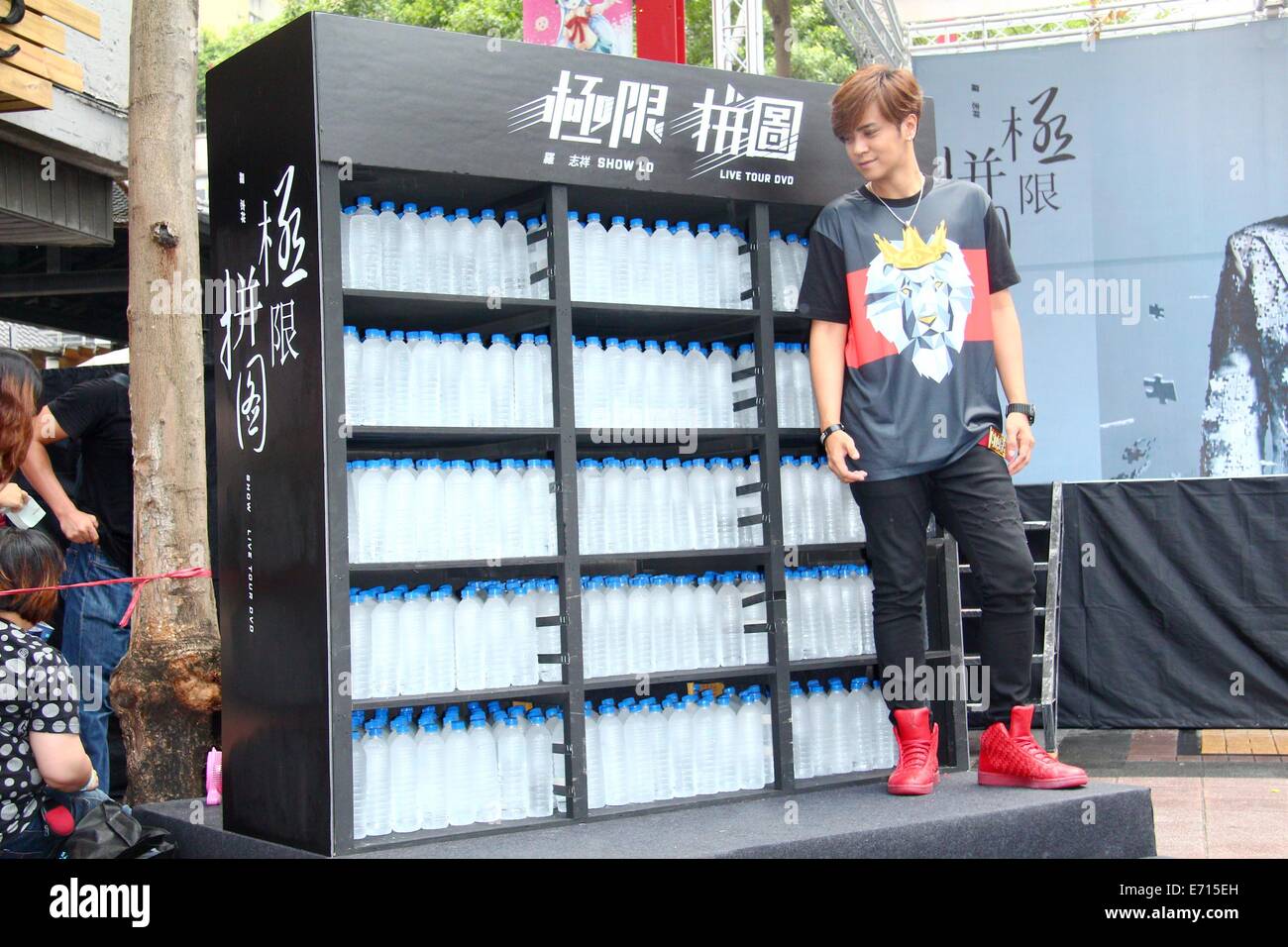 Taipei. 30th Aug, 2014. Singer, actor Show Lo attends a signing session ...