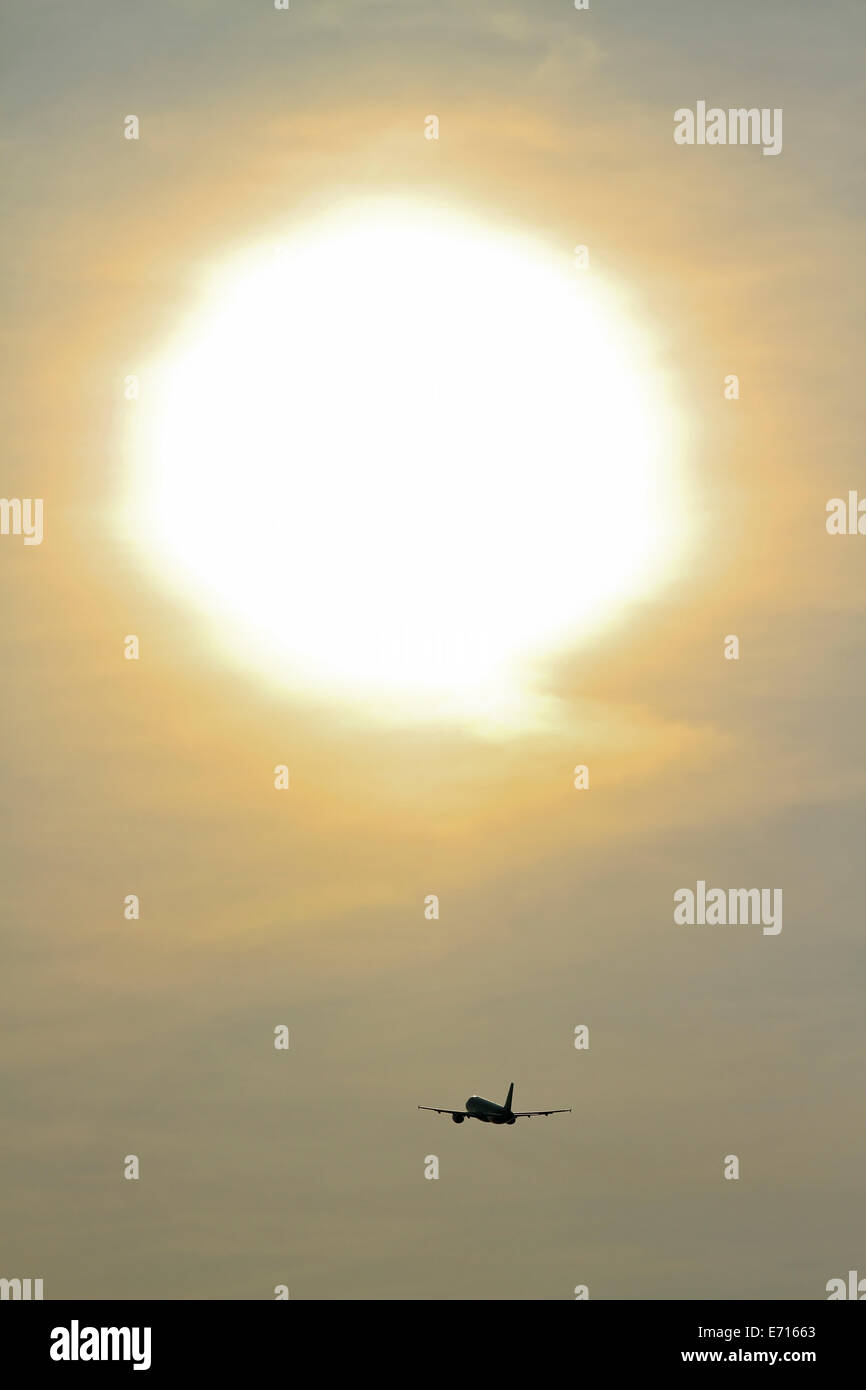 Airplane Flying Towards Sun High Resolution Stock Photography and ...