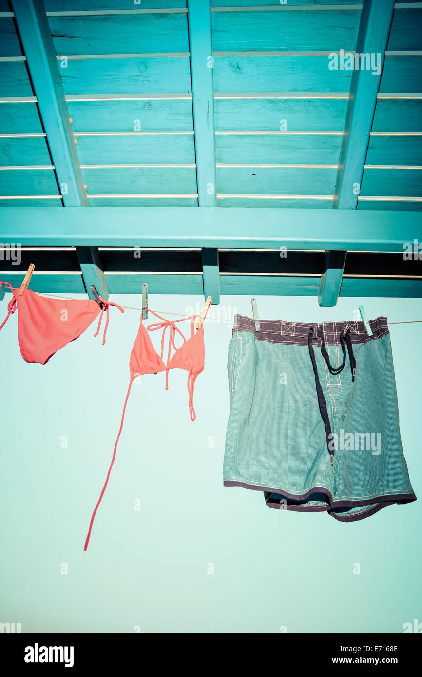 Greece, bikini and trunks drying on a washing line Stock Photo - Alamy