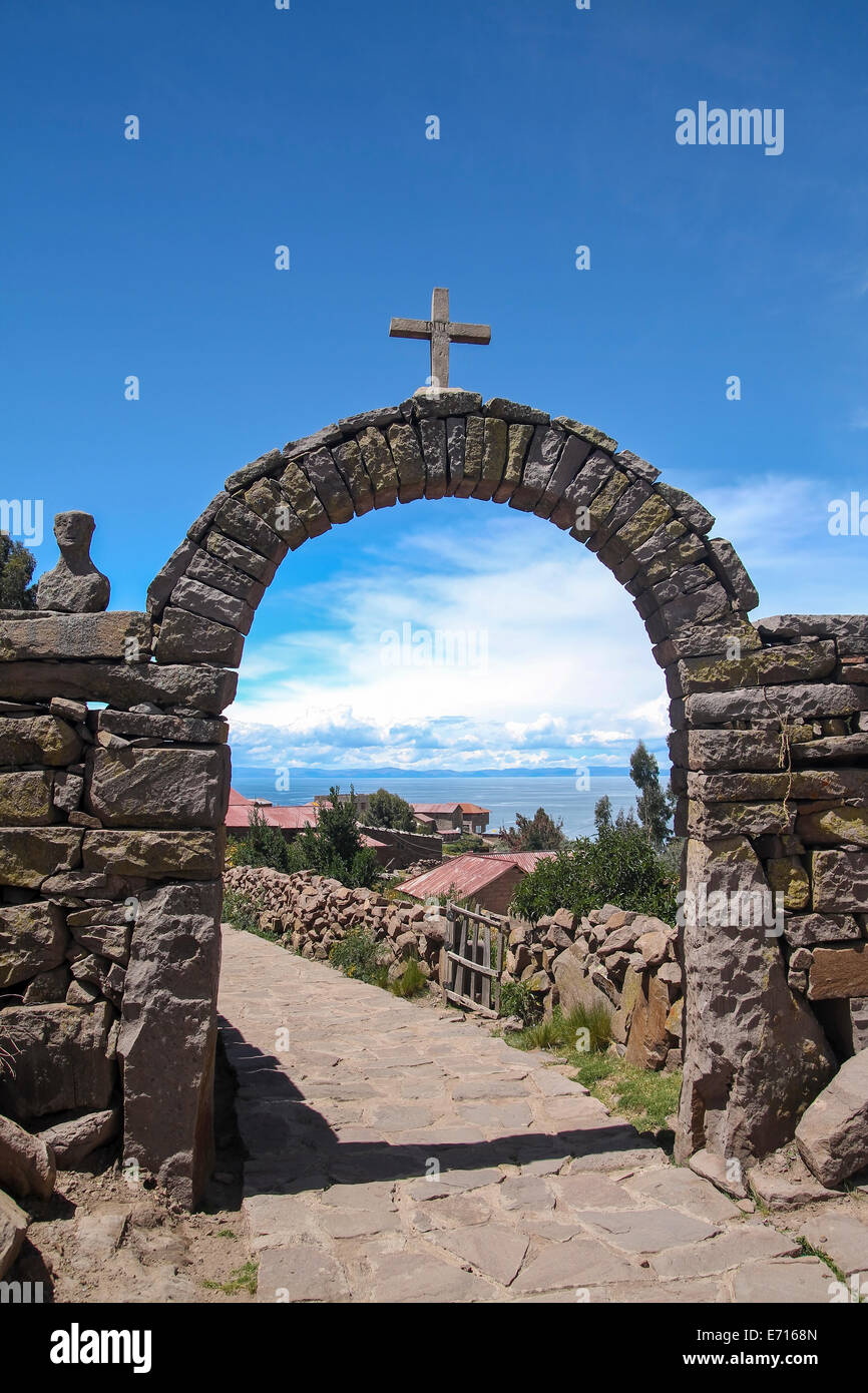 South America, Peru, Tacquile Island, Arch with cross and path Stock ...