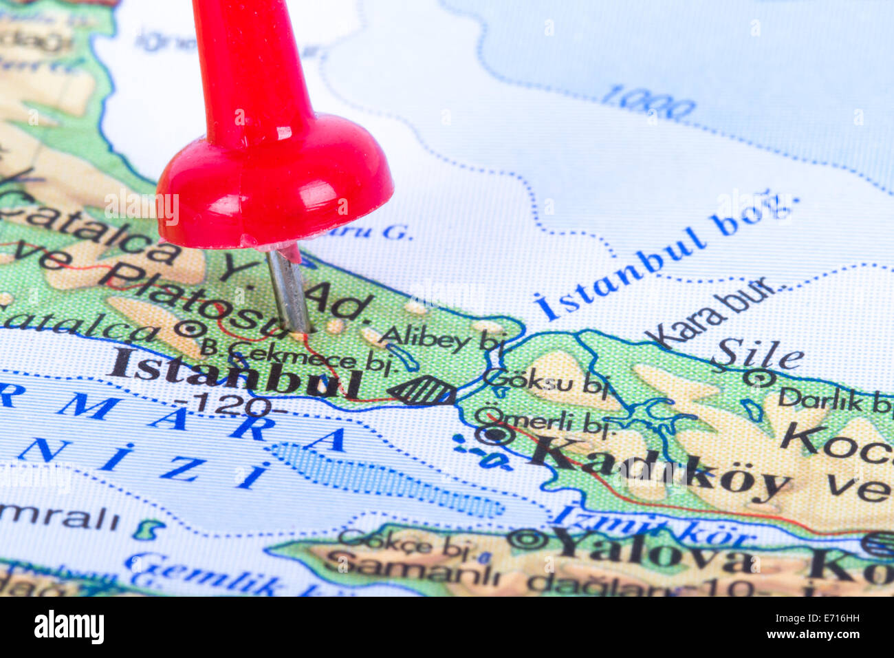 Red pushpin showing and pointing the location of destination point on ...