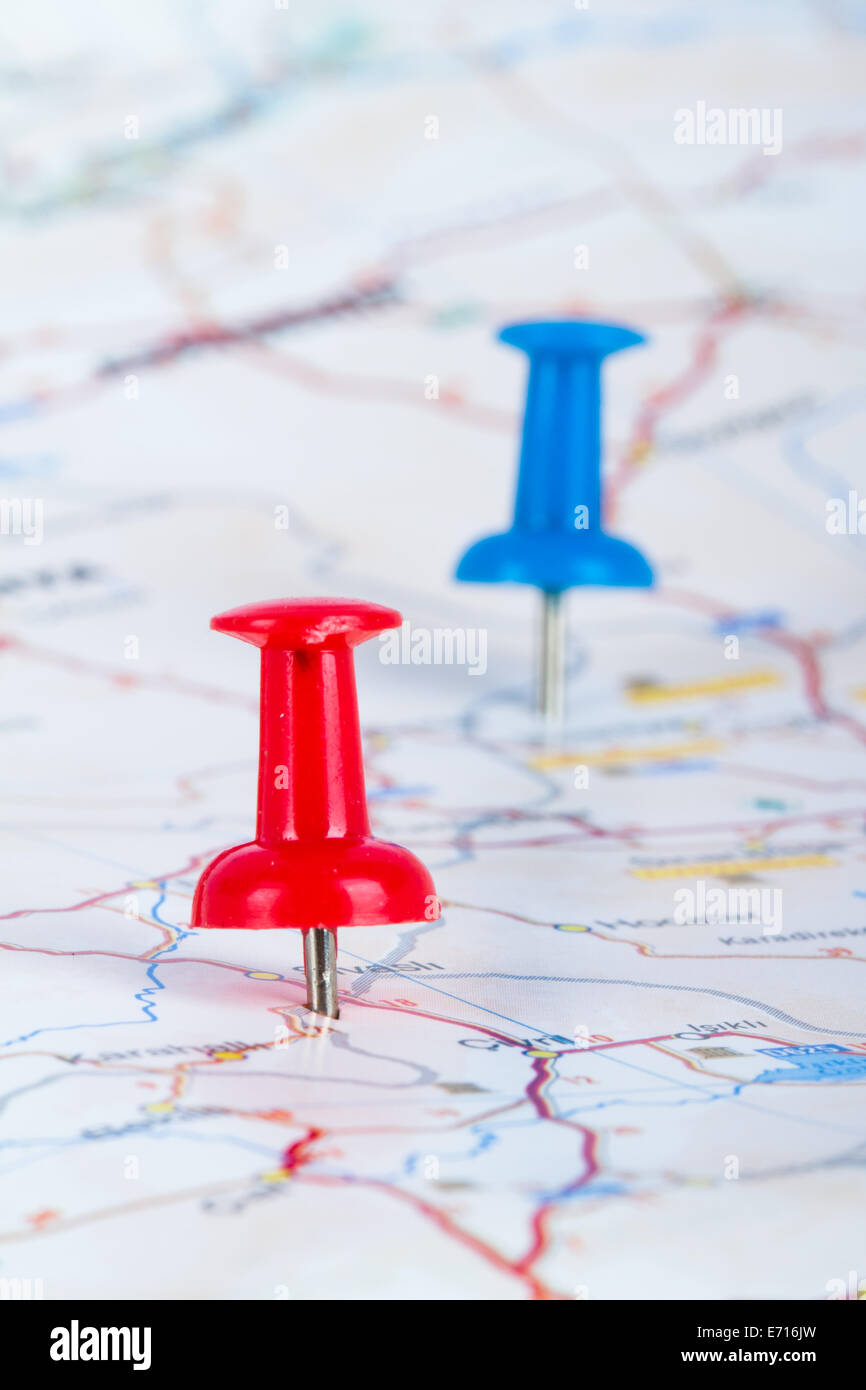 Red and blue pushpin showing and pointing the location of destination ...