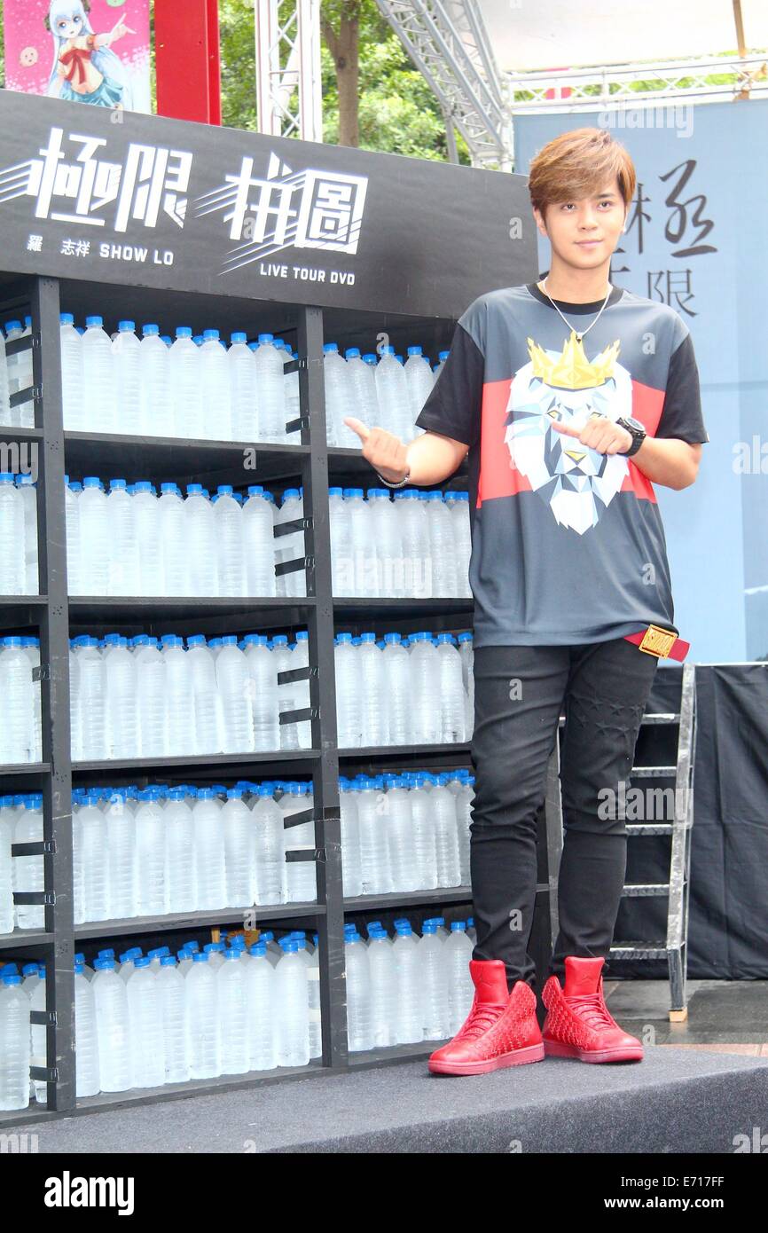 Taipei. 30th Aug, 2014. Singer, actor Show Lo attends a signing session ...