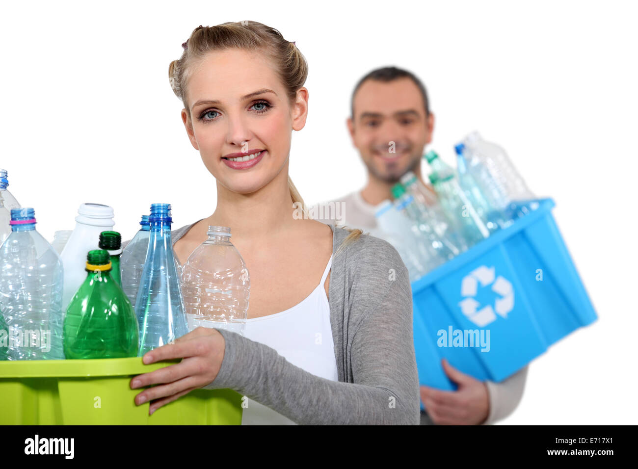 couple recycling plastic bottles Stock Photo - Alamy