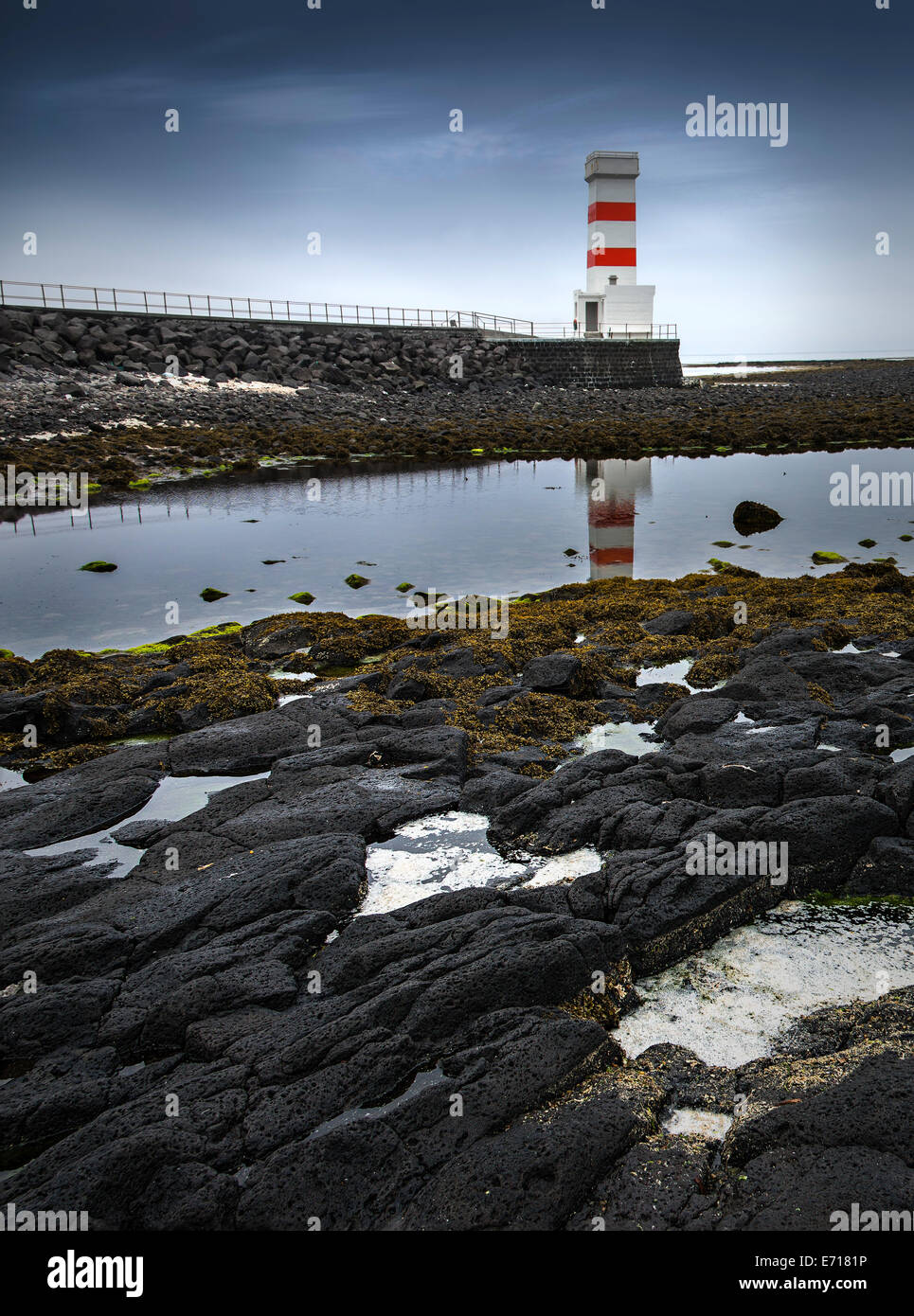 Iseland, Reykjanes, Gardur, Lighthouse at low tide Stock Photo - Alamy