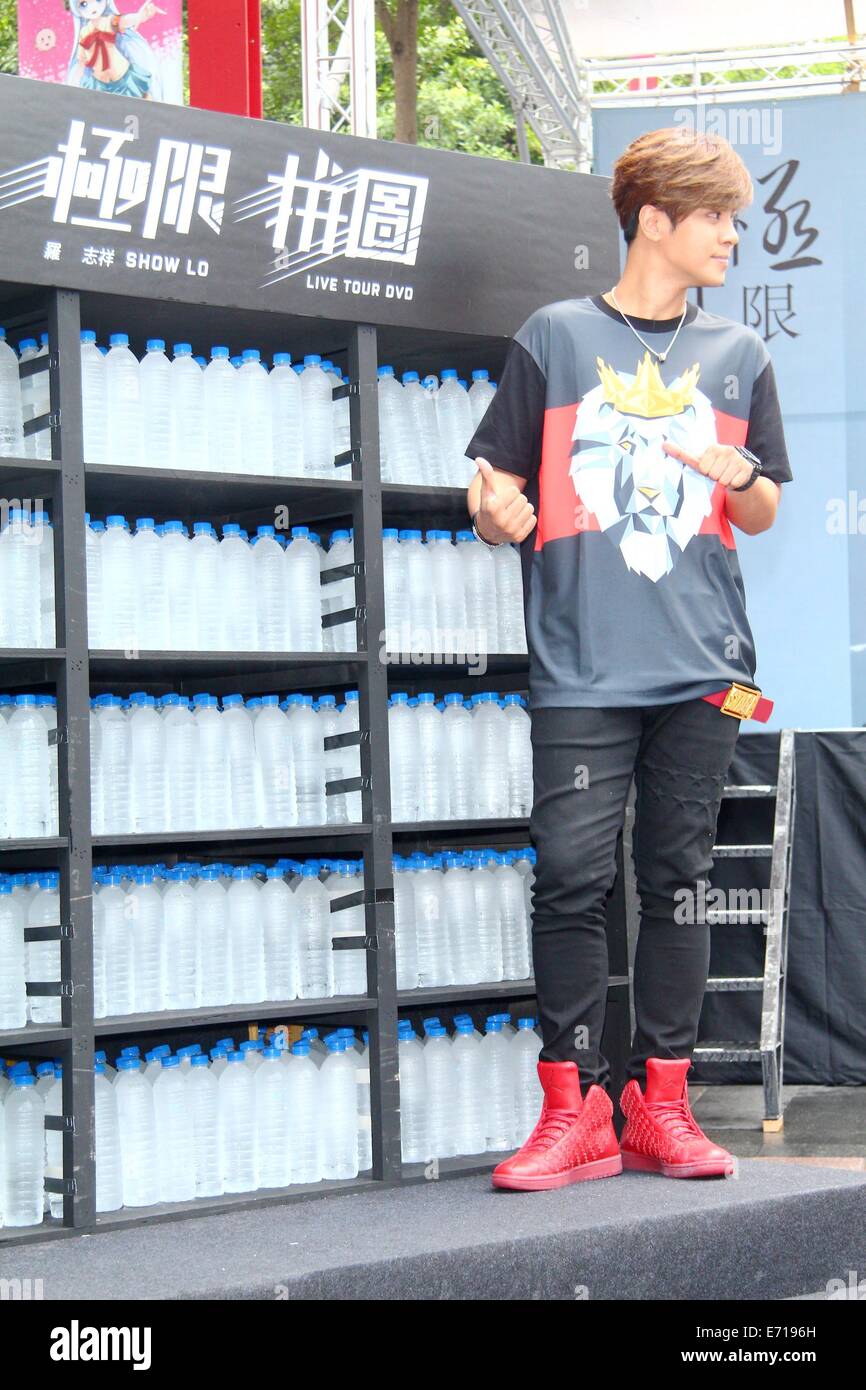 Taipei. 30th Aug, 2014. Singer, actor Show Lo attends a signing session ...