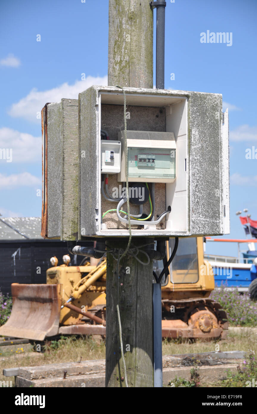 Damaged electric box Stock Photo - Alamy