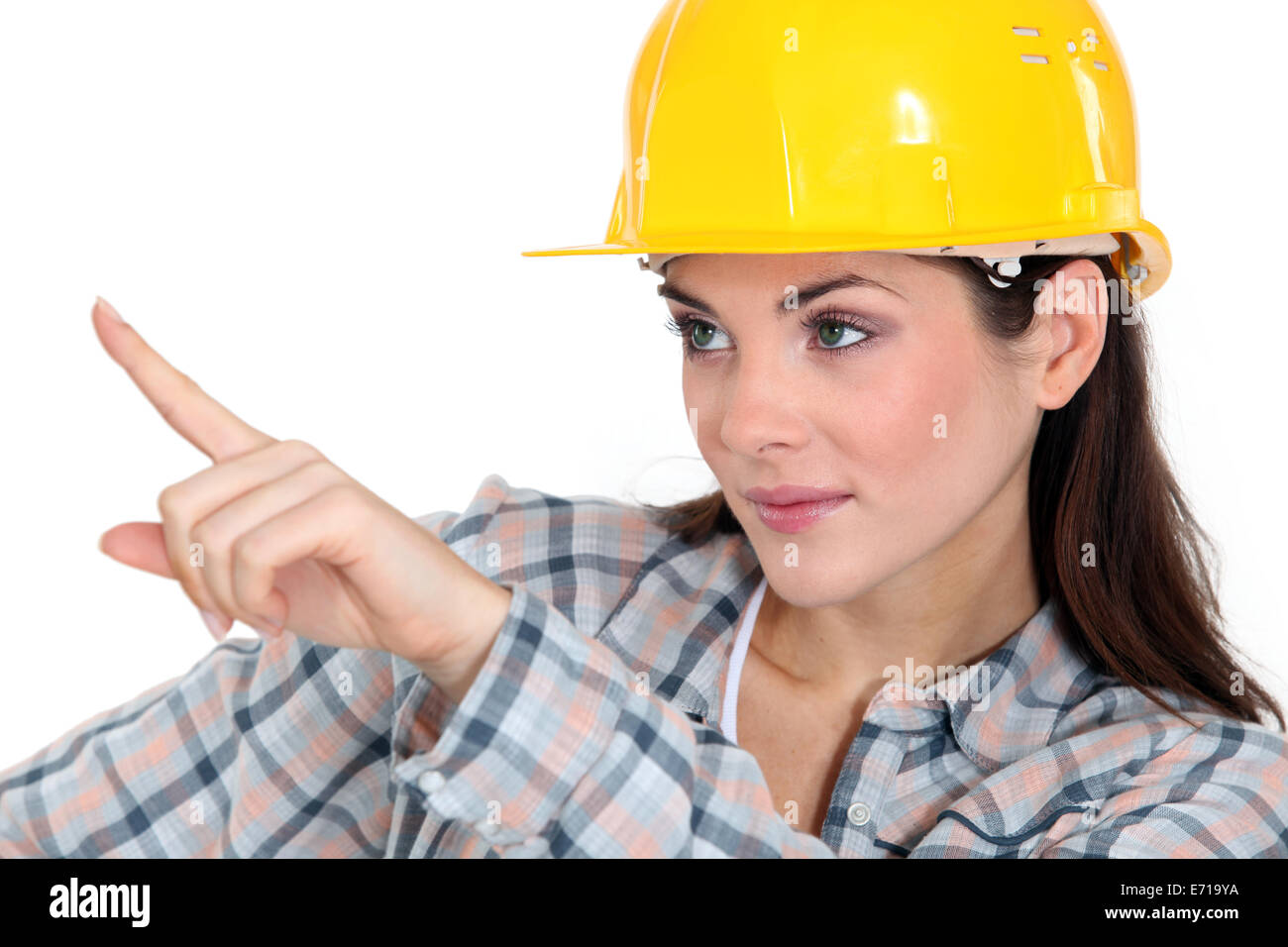 Construction worker pointing Stock Photo - Alamy
