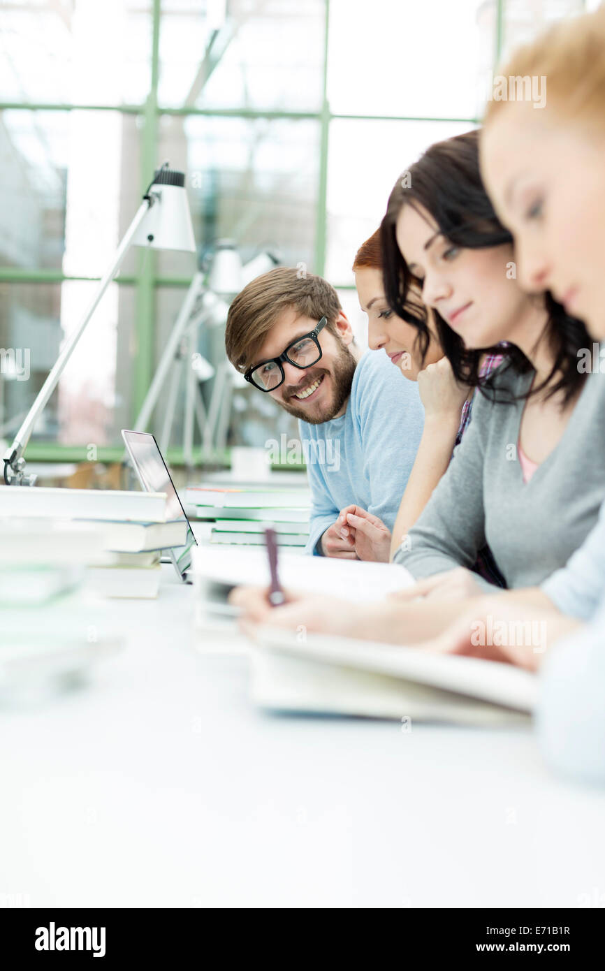 Students learning in a university library Stock Photo - Alamy