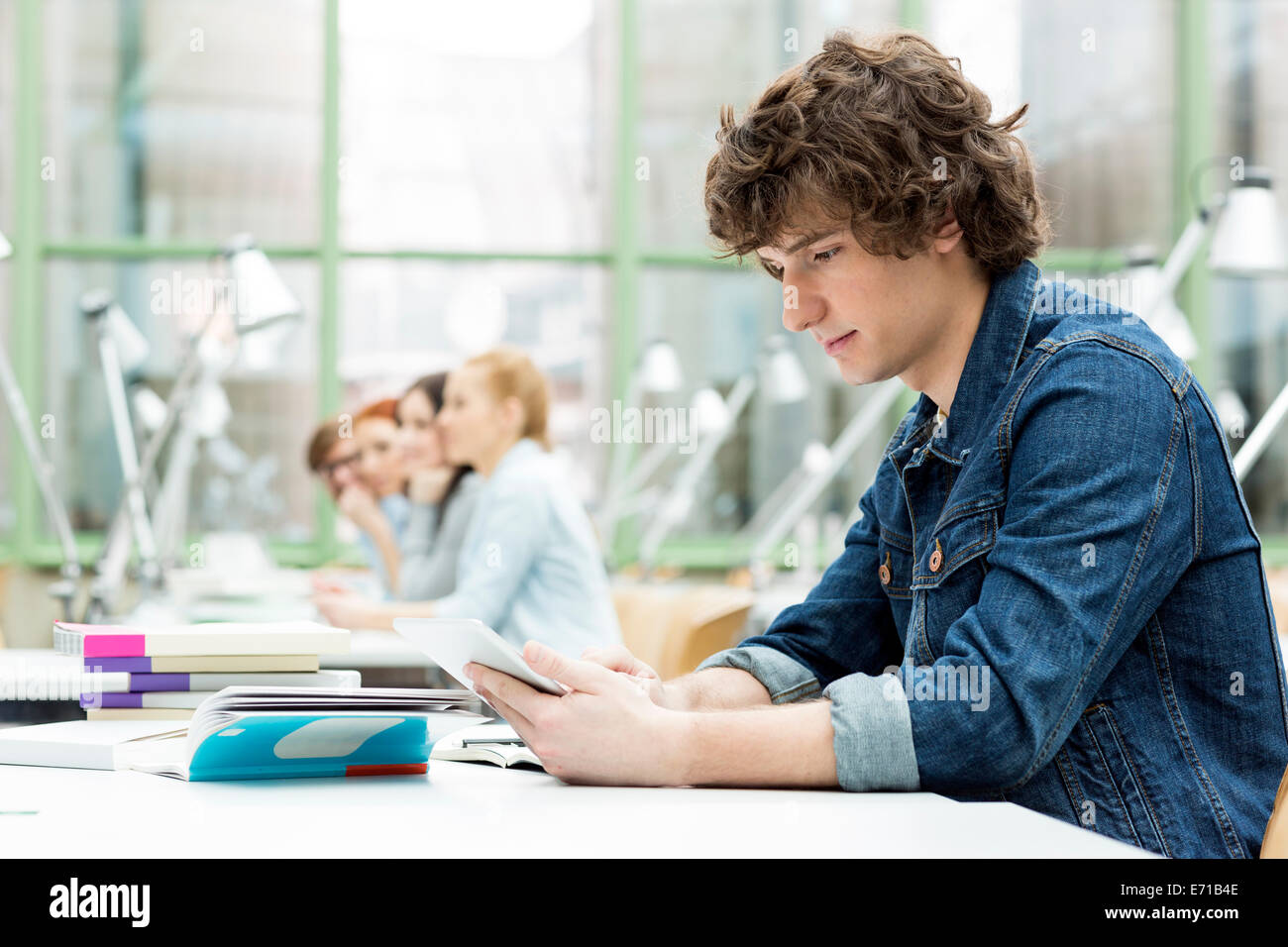 Student learning in a university library Stock Photo - Alamy