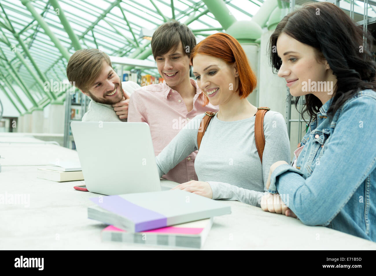 Students learning in a university library Stock Photo - Alamy