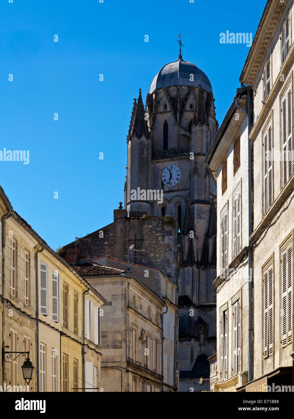 Traditional buildings in a street in the old part of Saintes a town in ...
