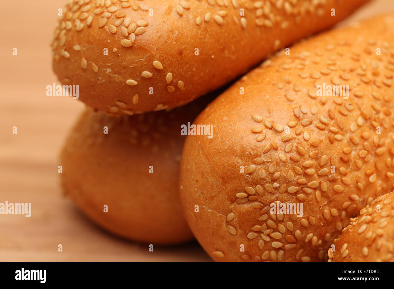 Bread rolls with sesame. Closeup Stock Photo - Alamy