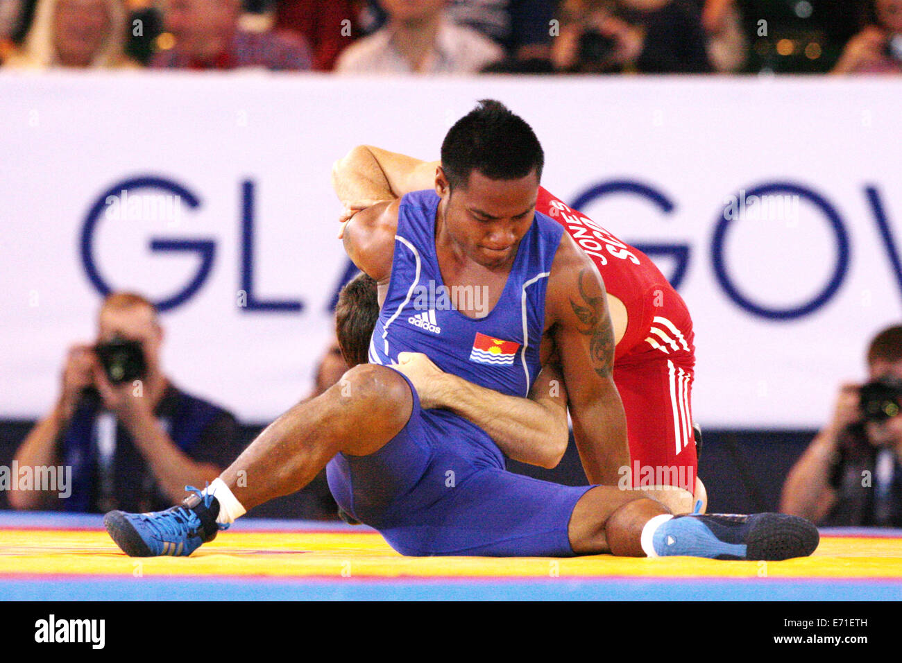 Gareth Jones of Scotland (red) v Timea Kitiona of Kiribati (Blue) in ...