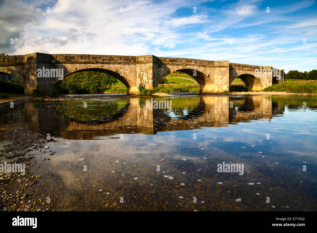 View of Burnsall five arched bridge, North Yorkshire over which the ...