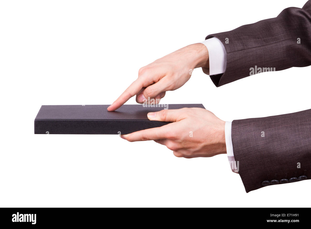 Businessman hand touching book as tablet with fingers, isolated on ...