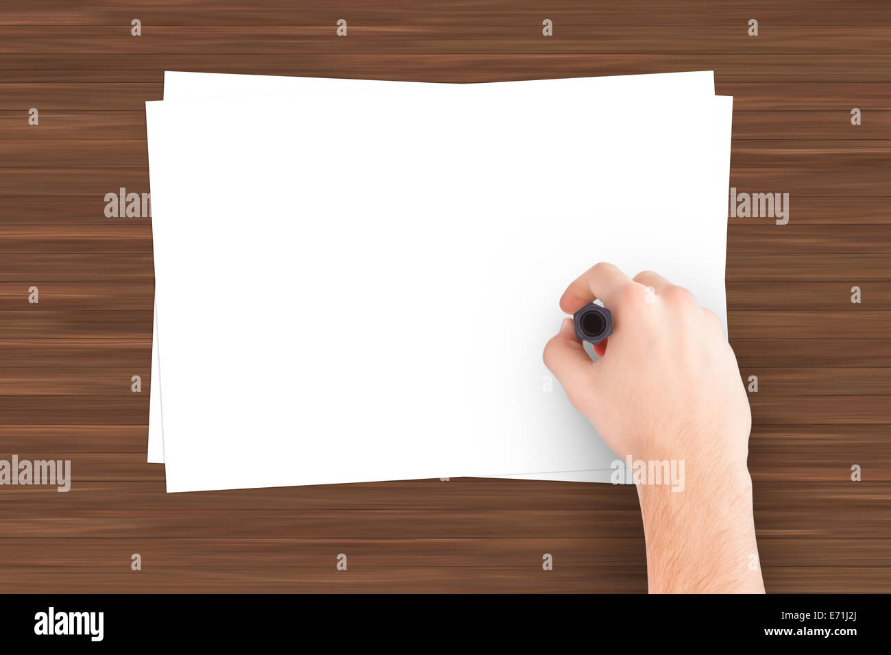 Hand writing on blank white note paper on wooden table Stock Photo - Alamy