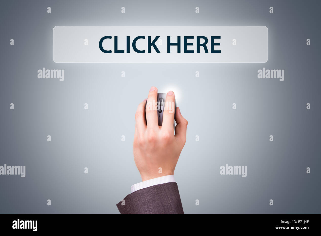 Technology concept, businessman hand holding mouse with click here text ...