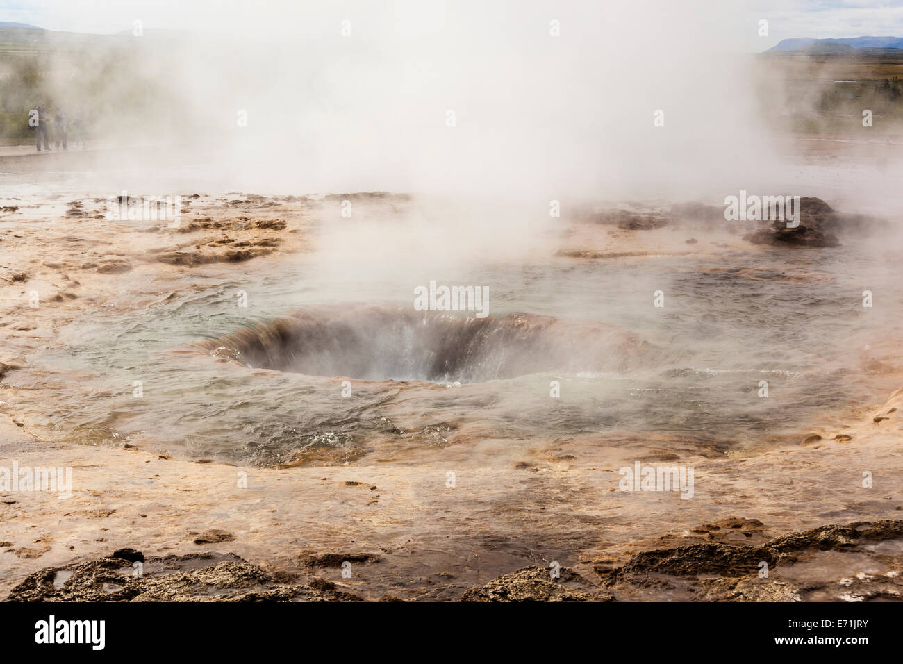 Strokkur geyser blow hole after an eruption, Geysir hot springs area ...