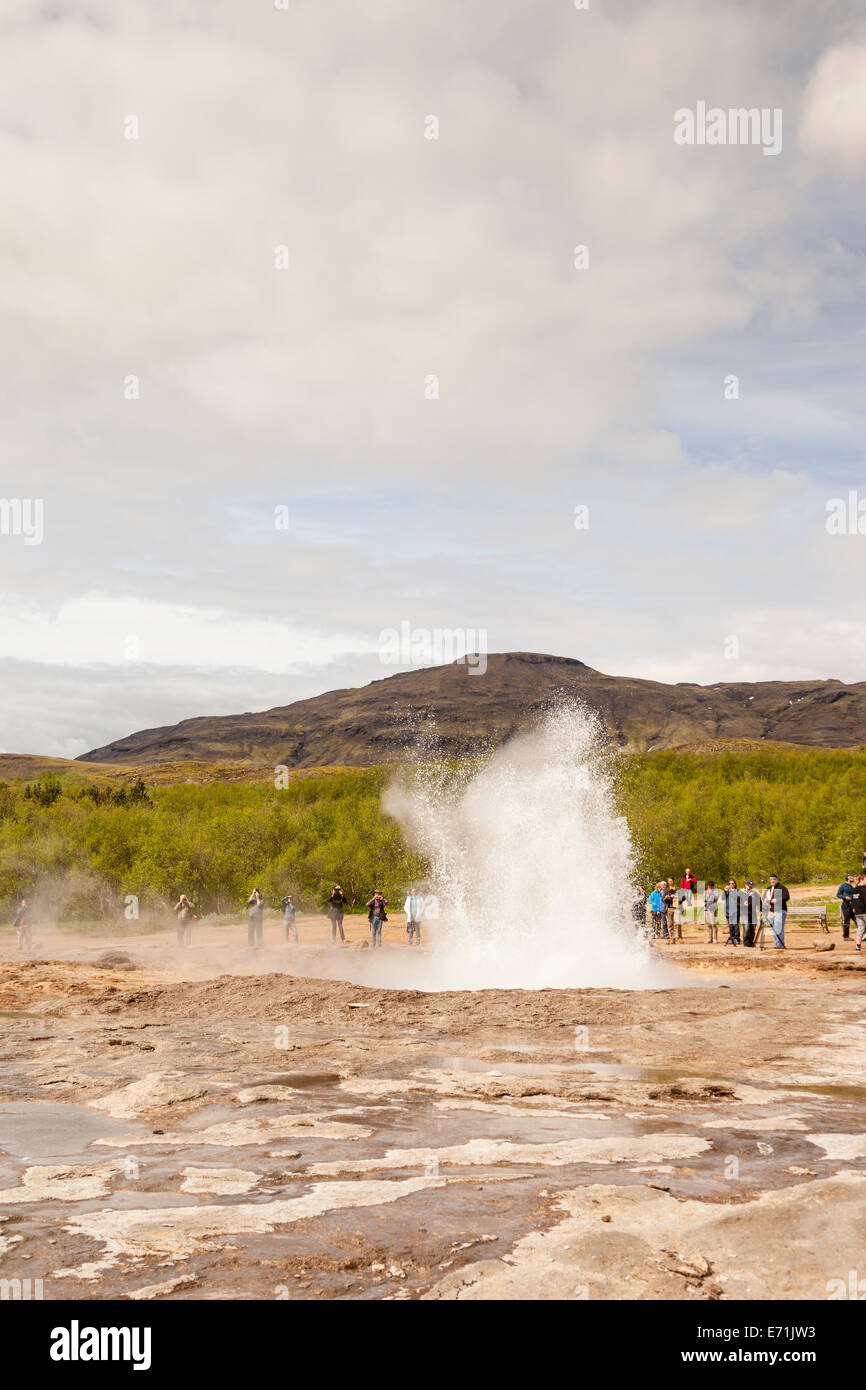 Strokkur geyser erupting, in the Geysir hot springs area, Haukadalur ...