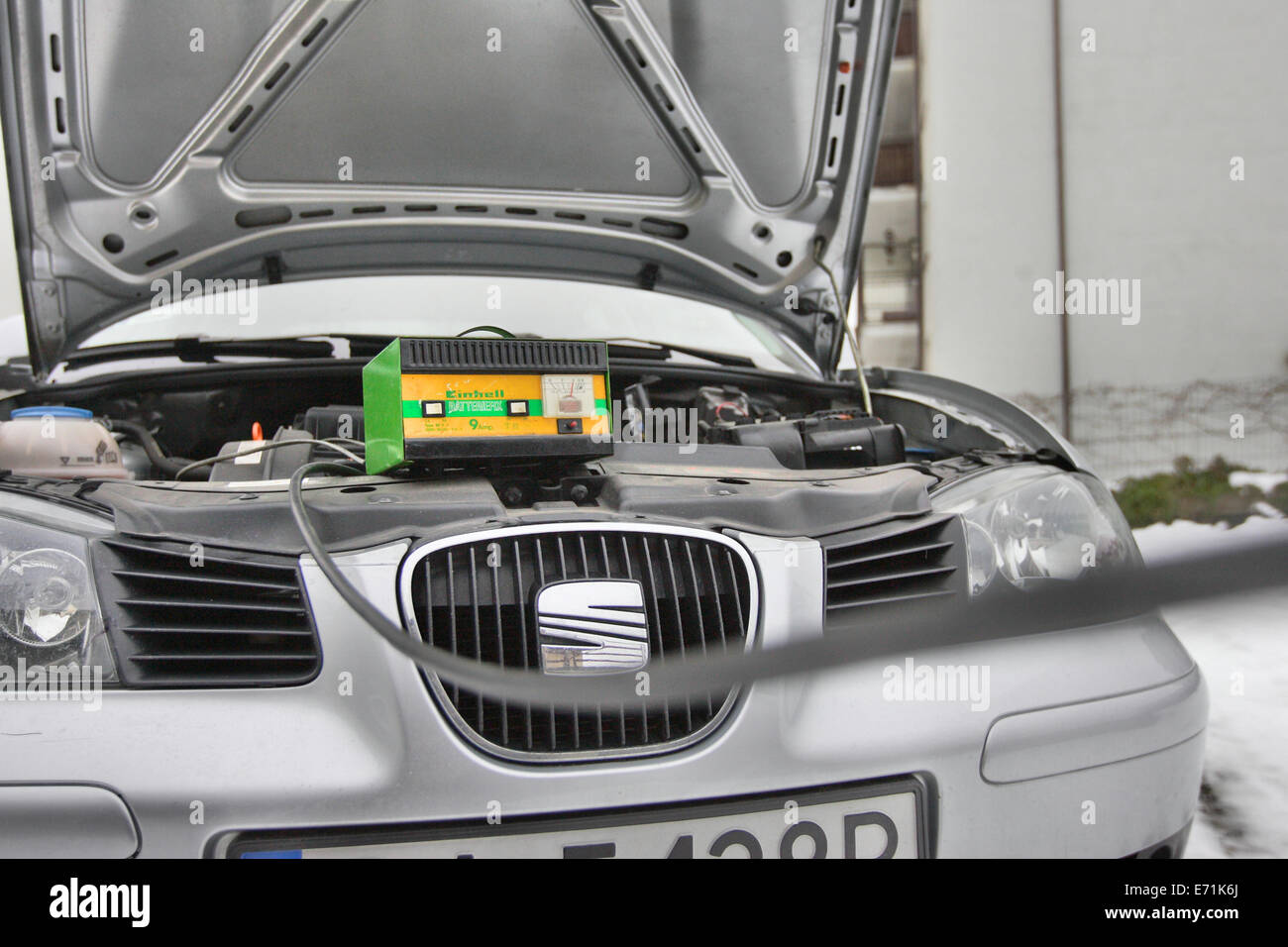 Charging car battery by the rectifier in the silver Seat Cordoba Stock ...