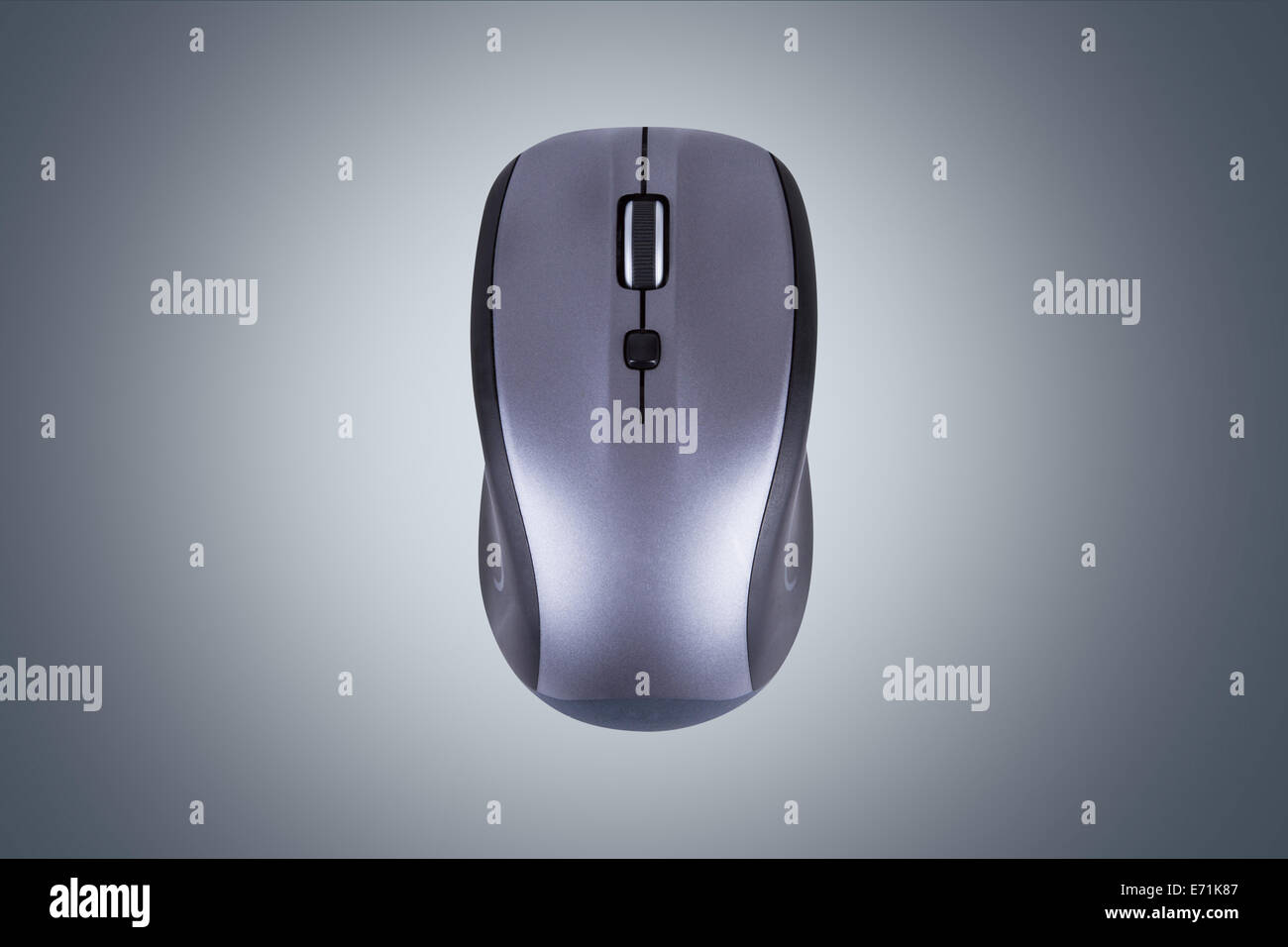 Single wireless mouse of desktop computer, top view over dark ...