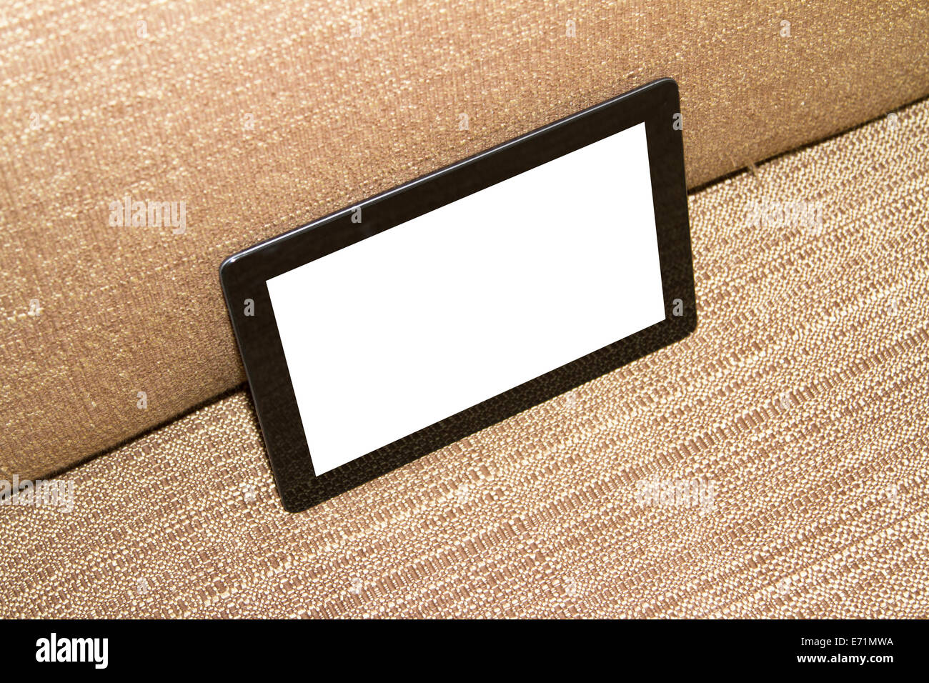 Tablet with blank white screen for your design in room Stock Photo - Alamy