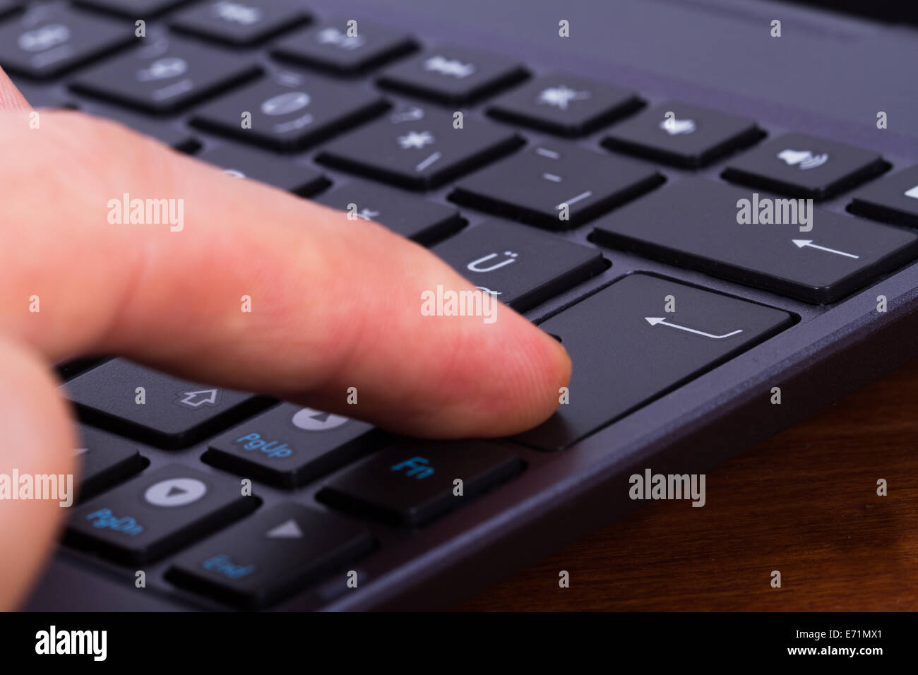 Finger pushing enter key hi-res stock photography and images - Alamy