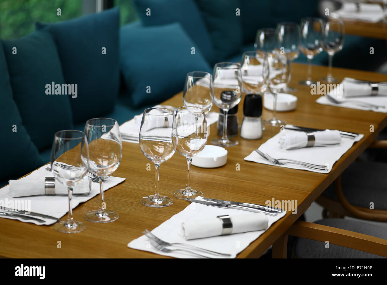 Shot with a dinner table in a restaurant Stock Photo - Alamy