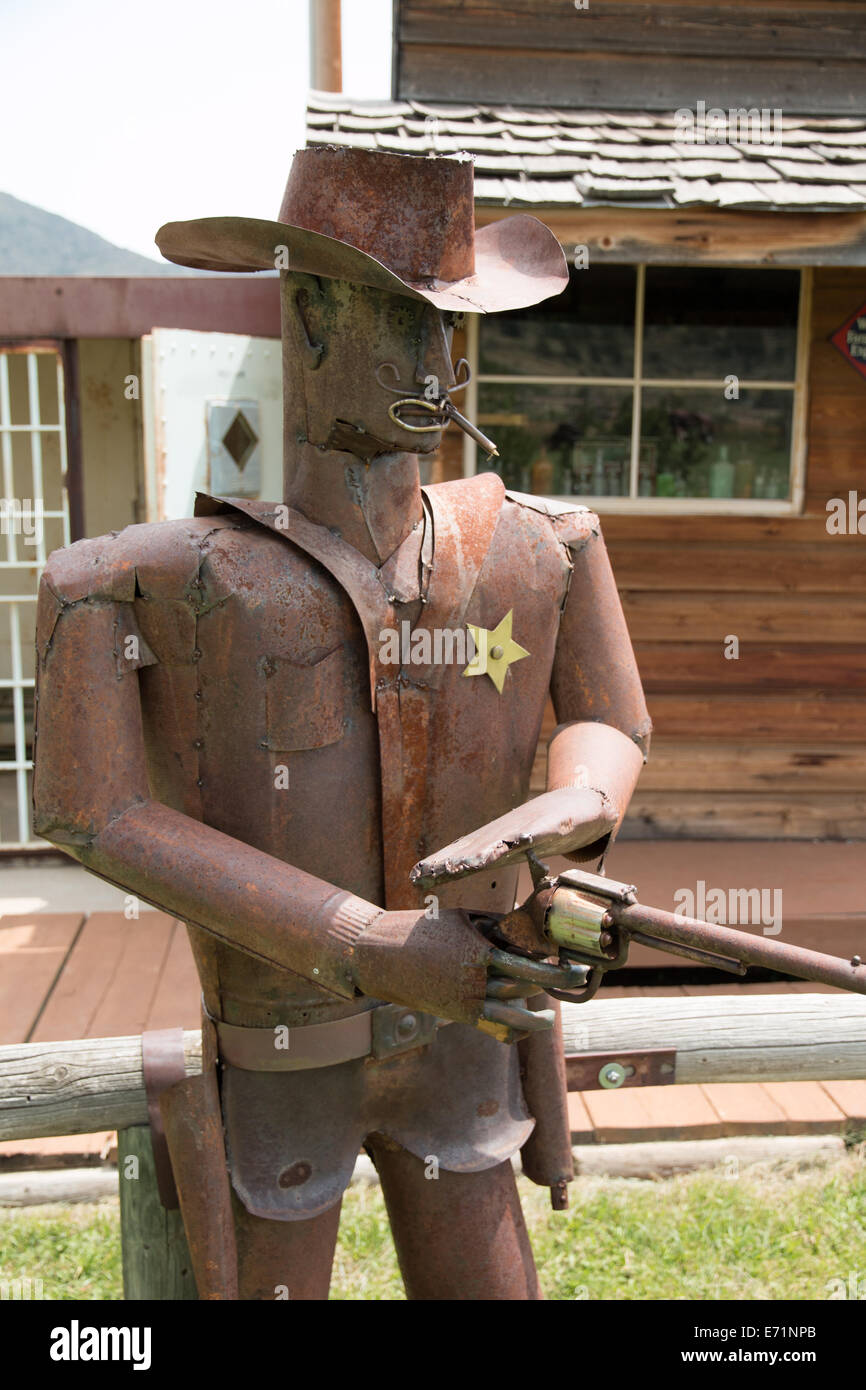 A metal statue of a Sherriff in Masonville, CO Stock Photo - Alamy