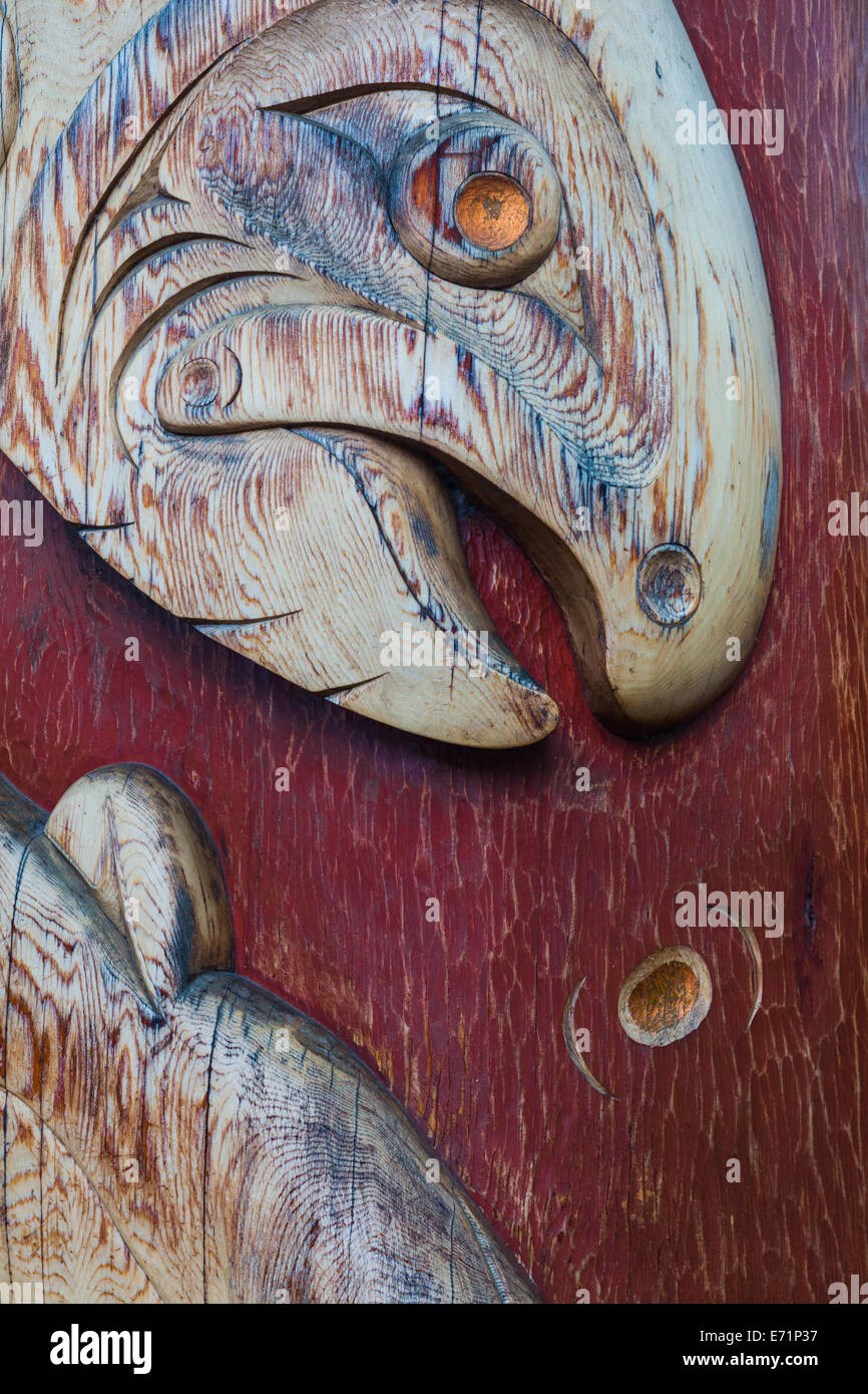 Abstract image of Salmon carved on the trunk of a cedar tree Stock ...