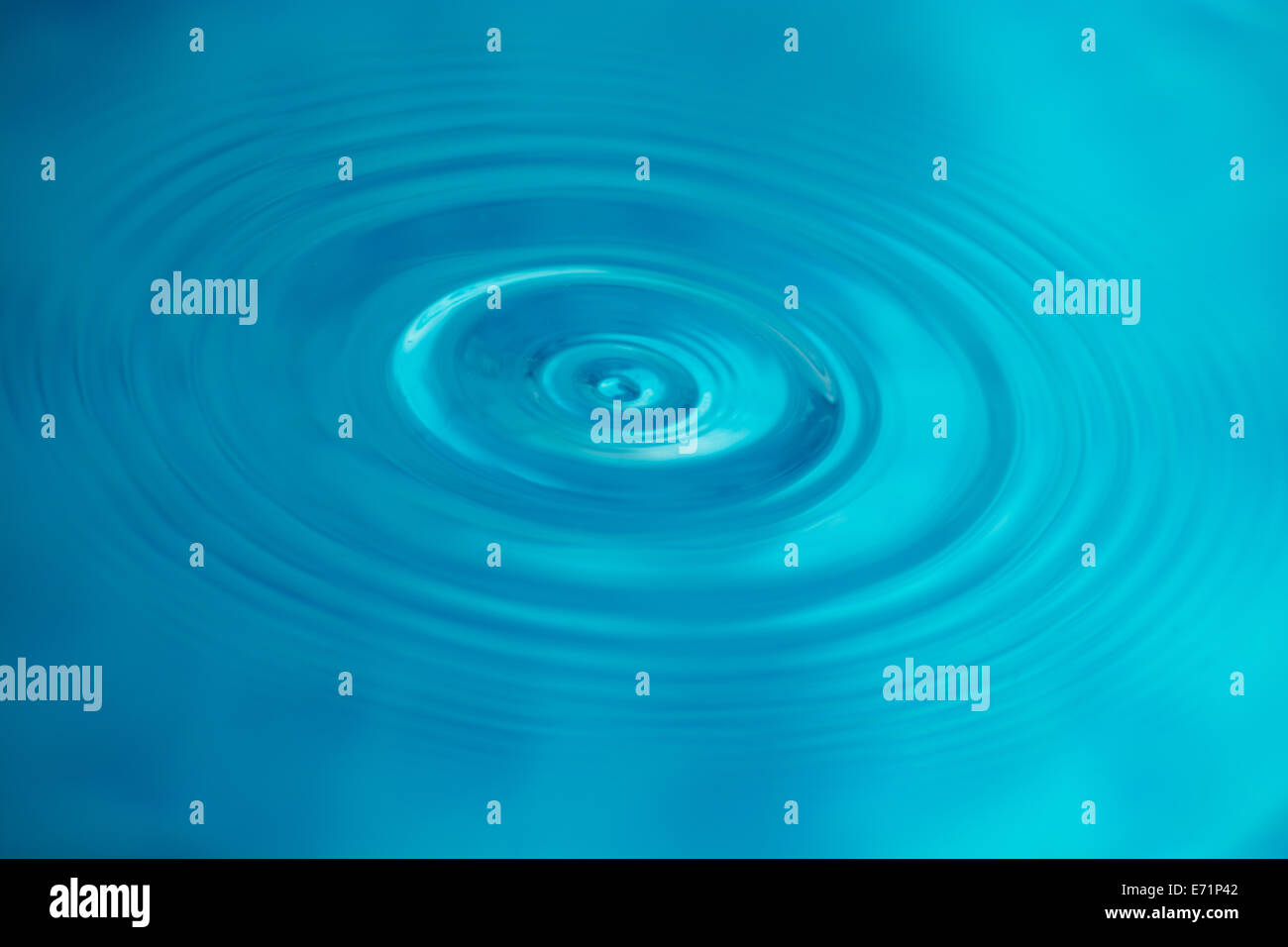 Water Drop on Calm Surface Stock Photo - Alamy