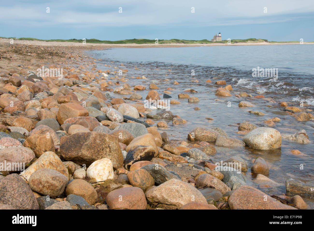 USA, Rhode Island, Block Island, Sandy Point. Rocky shoreline with ...