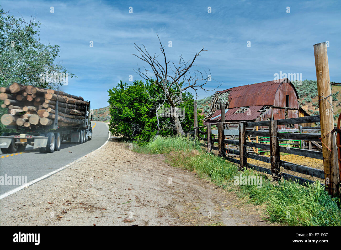 Country barn and logging truck Stock Photo - Alamy