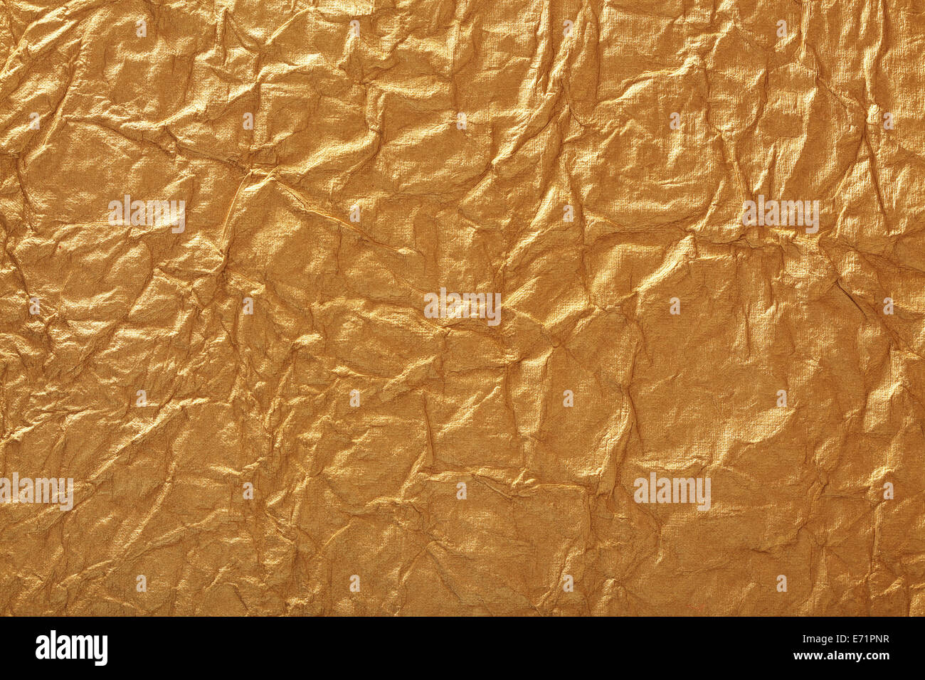 Crumpled gold paper Stock Photo - Alamy
