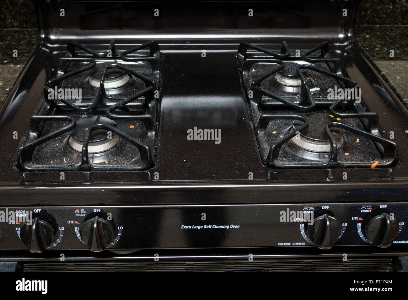 Dirty gas range Stock Photo - Alamy
