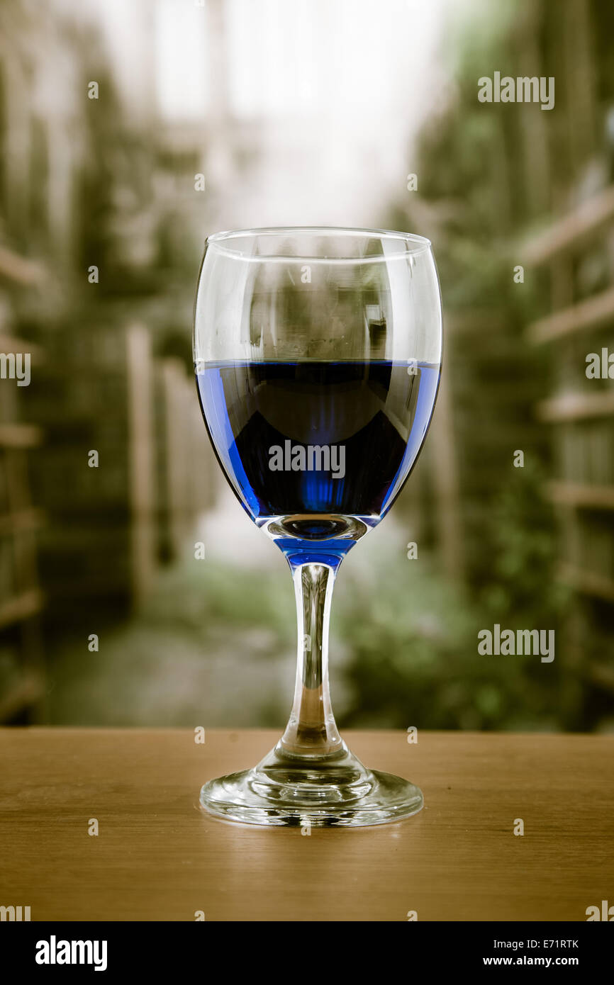 glass with blue liquor Stock Photo - Alamy