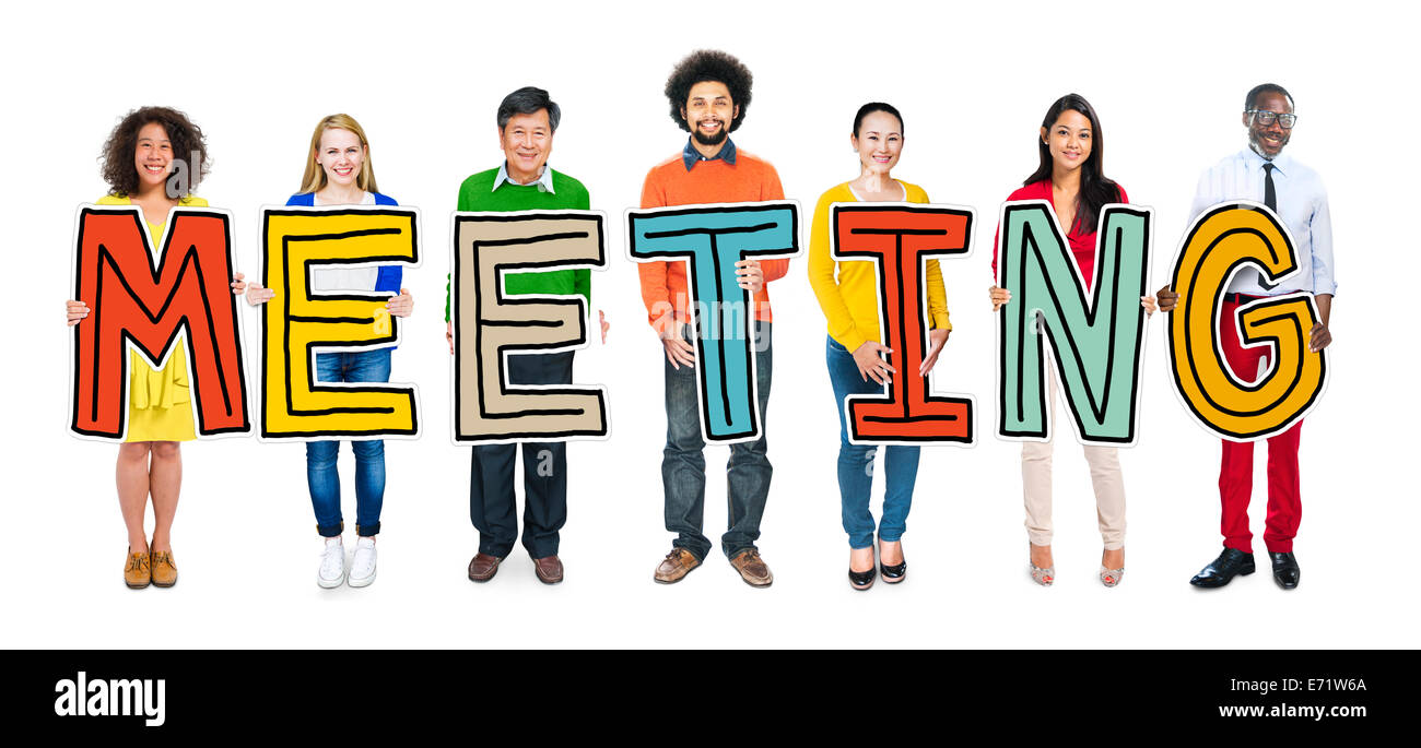 Group of People Standing Holding Meeting Letter Stock Photo - Alamy