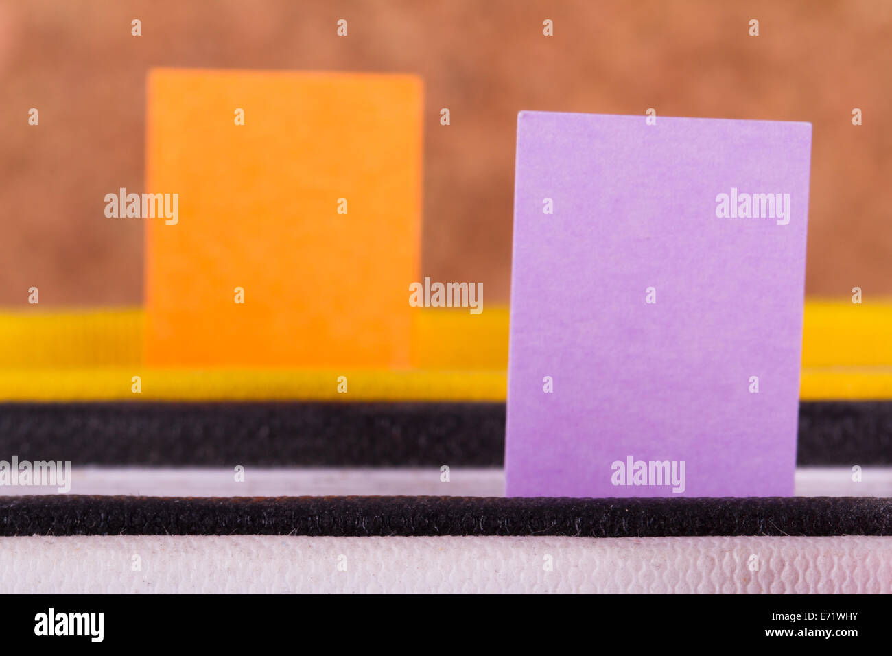 Colorful post it tag markers inside books Stock Photo - Alamy