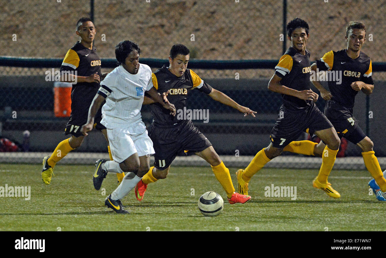 Albuquerque, NM, USA. 3rd Sep, 2014. Cibola's #11 Isaiah Juarez battles ...