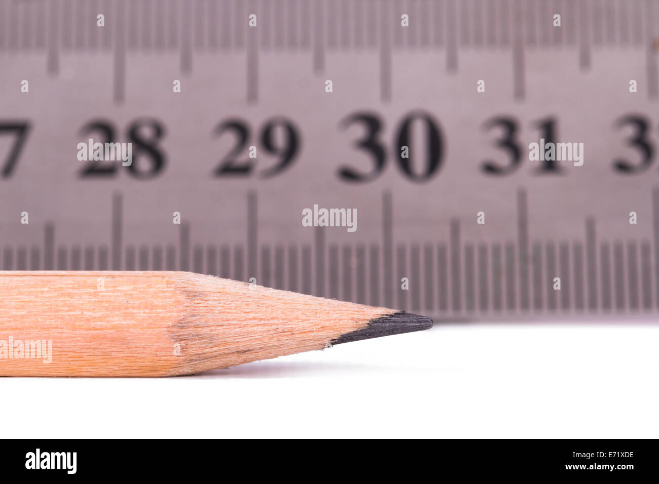 Close up view of wood pencil and steel ruler for engineering drawing ...