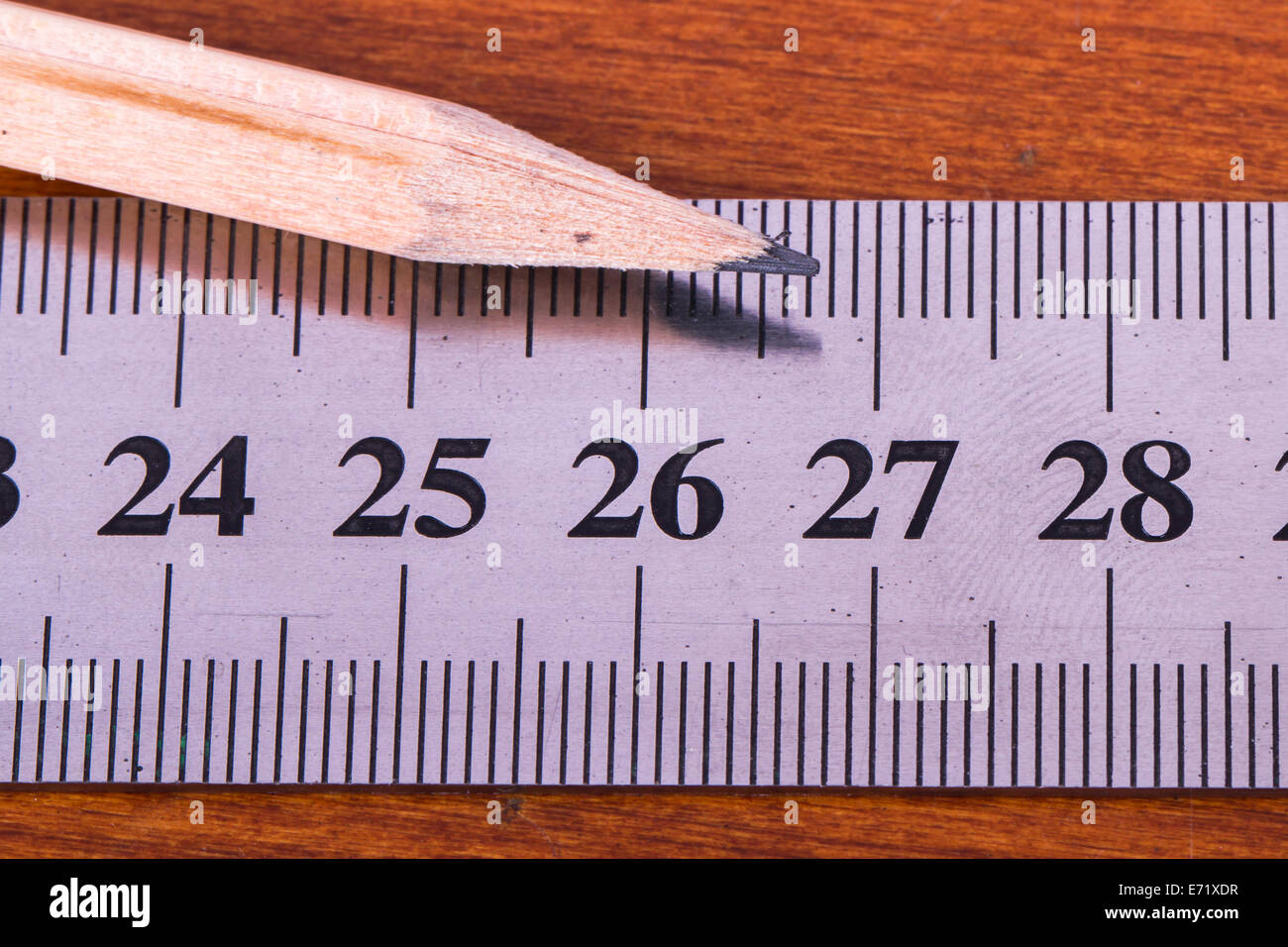 Close up view of wood pencil and steel ruler for engineering drawing on ...