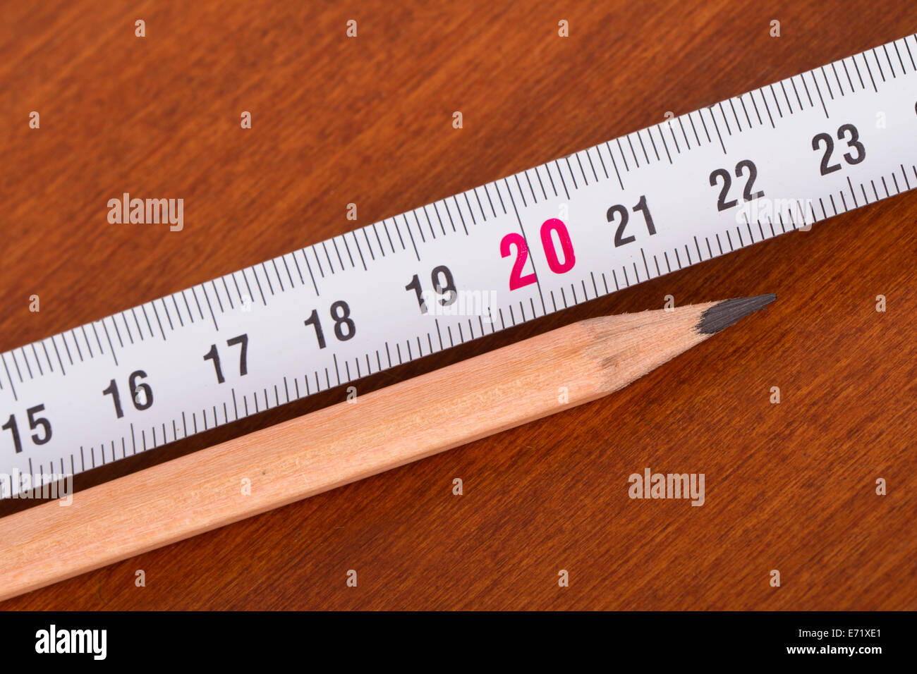 Top view of wood pencil and steel ruler for engineering drawing on ...